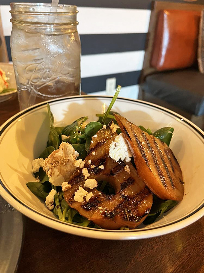 Not just another salad—grilled fruit, fresh greens, and crumbled cheese create a symphony of flavors. Even confirmed carnivores might be tempted to cross over.