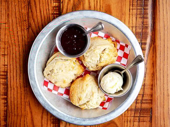 These biscuits don't just rise—they ascend to heavenly heights. Paired with jam and butter, they're the kind of carbs worth breaking promises for.