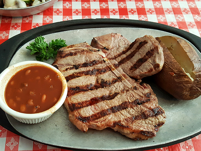 Grill marks aren't just decoration—they're flavor tattoos. This perfectly seared steak with its baked potato sidekick is what cowboys dream about after a long day.