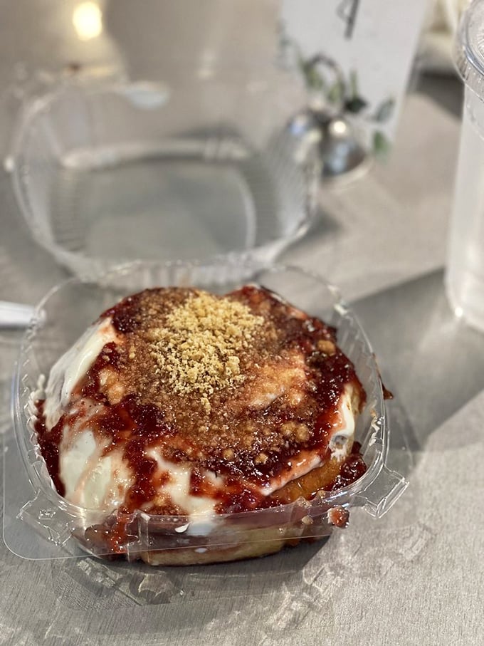 Not your mall food court cinnamon roll—this strawberry cheesecake creation is what would happen if dessert went to finishing school.