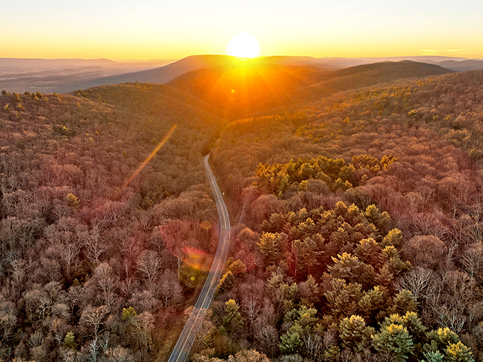 The roads winding through Pennsylvania's rolling hills near Mifflinburg offer sunset views that make even a confirmed city dweller consider country living.