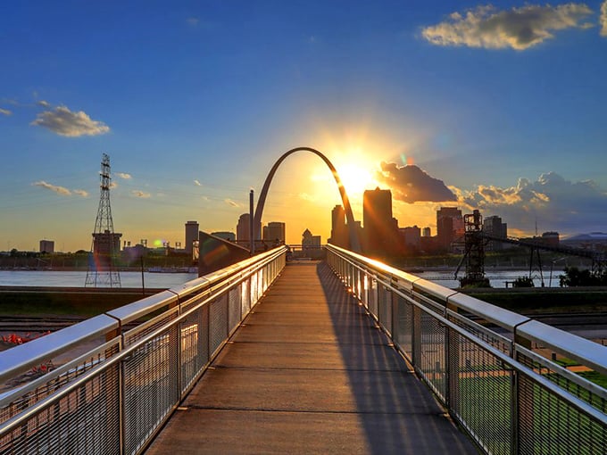 Sunset transforms the Gateway Arch into a golden gateway, visible from Maplewood's nearby parks—a reminder that affordable living doesn't mean sacrificing spectacular views.
