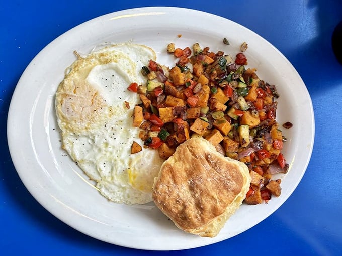 Breakfast hash that's having more fun than you are at 9am. Those sunny eggs are basically saying, "Good morning, gorgeous!"