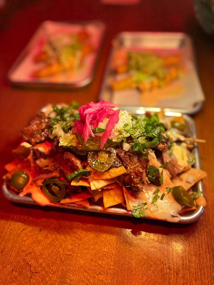 These nachos aren't just tipsy—they're doing the full salsa dance on your taste buds. The meat-to-cheese-to-chip ratio is mathematical perfection.