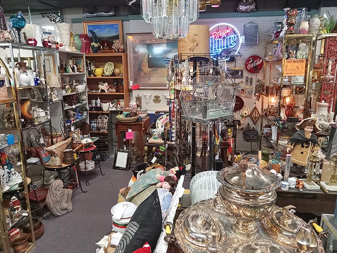 Organized chaos that would make Marie Kondo weep—but every single item here sparks joy for someone. That Miller High Life sign? Pure nostalgia.