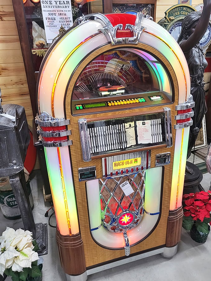 This isn't just a jukebox—it's a time machine disguised as furniture, ready to transport you back to sock hops and first kisses. 