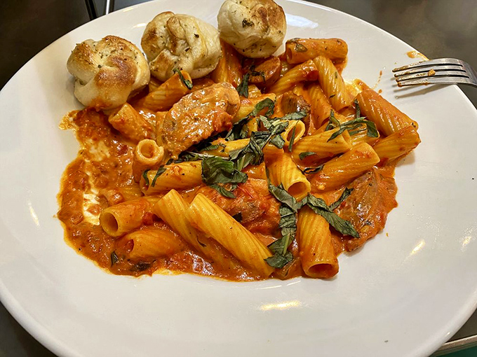 Rigatoni vodka that would make an Italian grandmother nod in approval, with garlic knots that could double as pillows for very tiny, very lucky people.