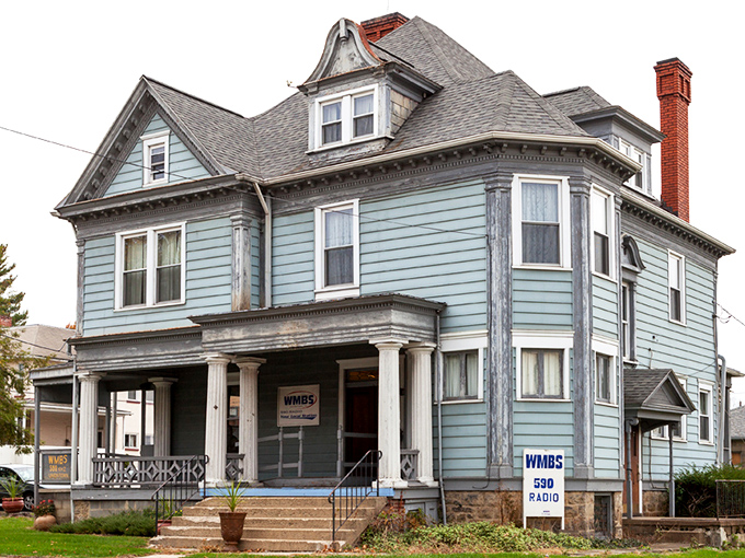This blue Victorian house has seen more Uniontown history than your grandmother's photo albums. Now serving the community as WMBS Radio—from historic home to airwaves.
