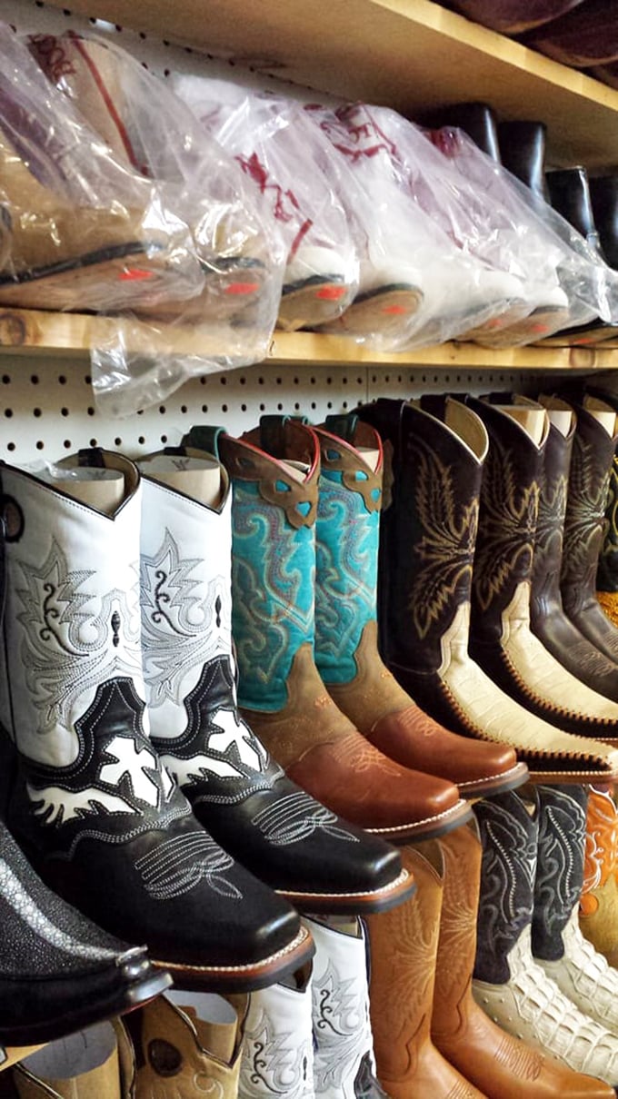 Cowboy boots lined up like hopeful dancers at a Texas hoedown. Each pair tells a story—yours is waiting to be written.