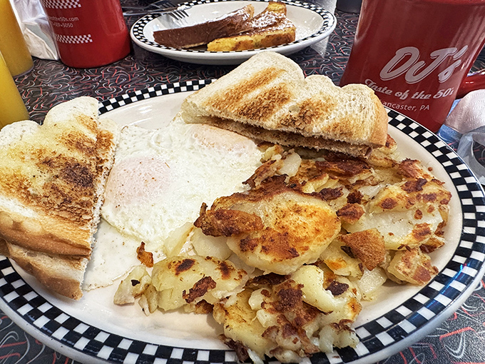 Breakfast perfection doesn't need fancy names or truffle oil. Just perfectly crispy home fries, eggs your way, and toast that's actually toasted by someone who cares.