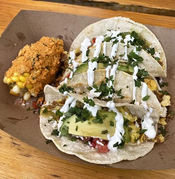These breakfast tacos aren't just food—they're little tortilla-wrapped packages of morning joy, dressed up with enough green to make your day vibrant.