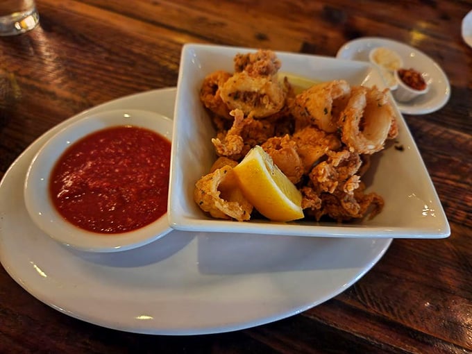 Crispy calamari that doesn't need a passport to transport you to a seaside Italian village—just a squeeze of lemon and that perfect marinara.