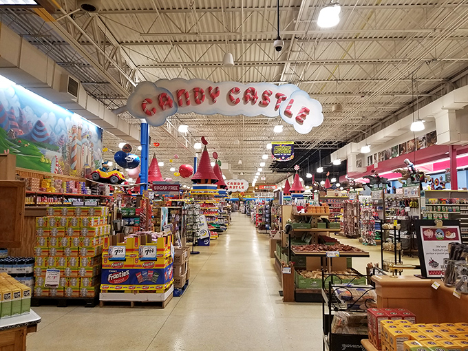 Sugar rush headquarters! The "Candy Castle" sign isn't kidding around—this sweet section houses enough confections to make Willy Wonka consider a career change.