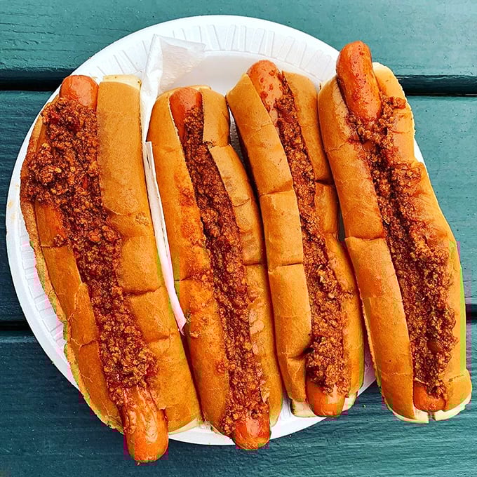 Hot dogs with attitude – split, grilled, and topped with that signature chili that's worth the extra napkins and the knowing nods from regulars.