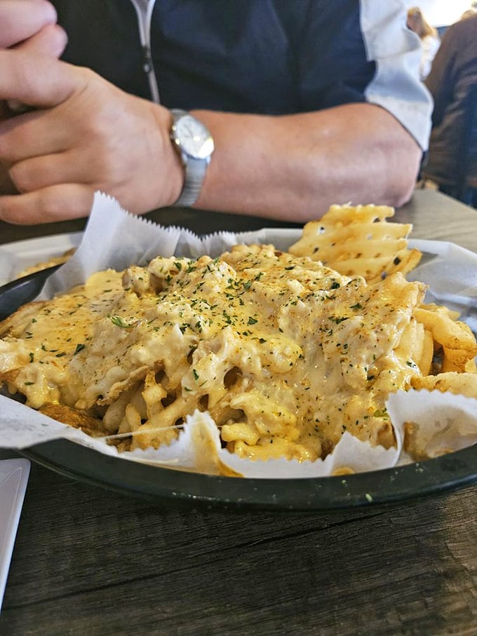 These loaded fries aren't just a side dish—they're a main event. Smothered in cheesy glory, they're the reinforcements your hunger needs.