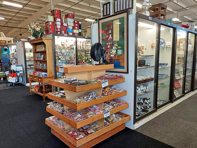 This candy store for collectors arranges temptation in tidy rows—wooden displays offering everything from vintage pins to yesterday's playthings. 