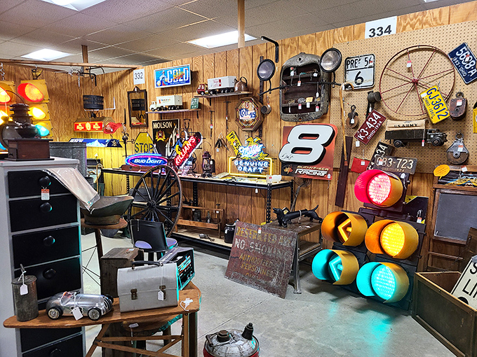 A symphony of Americana in traffic lights, license plates and neon signs—a garage sale curated by someone with impeccable taste and questionable storage space.