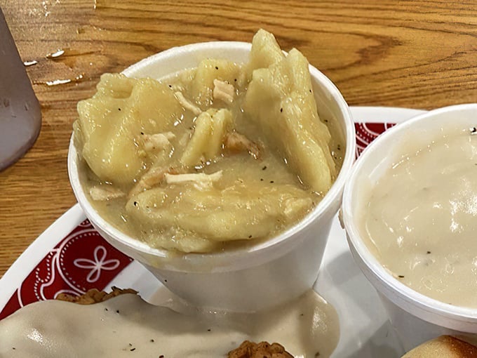 Chicken and dumplings that would make your grandmother both jealous and proud—pillowy dough swimming in rich, homestyle broth.