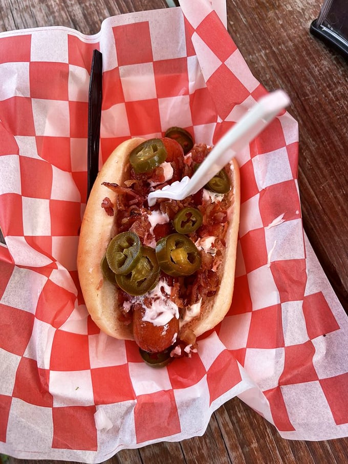 Jalapeños and cream cheese create the ultimate hot dog harmony—like finding the perfect dance partner at summer's best backyard barbecue.