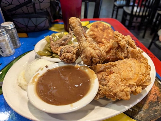 Golden, crispy, and utterly magnificent—this fried chicken has clearly taken a PhD course in how to achieve the perfect crust-to-juicy-meat ratio.
