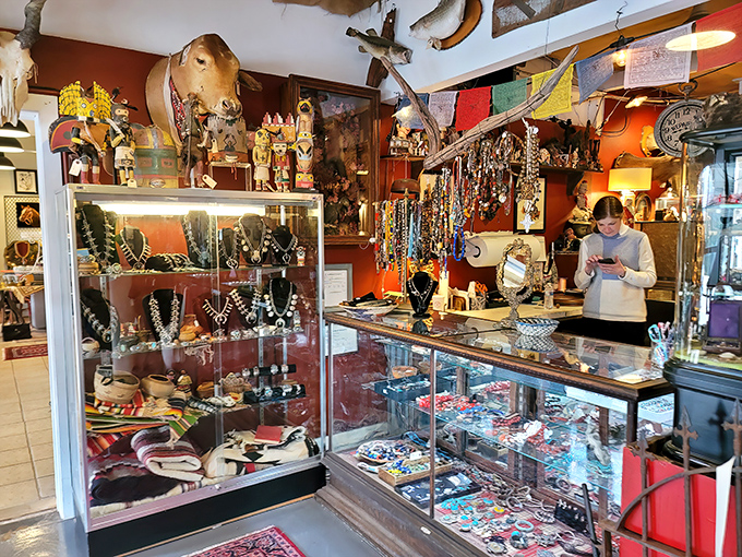 Jewelry cases gleam with decades of personal adornment history—each brooch, necklace and ring carrying stories of celebrations, heartbreaks, and everyday elegance from another era.
