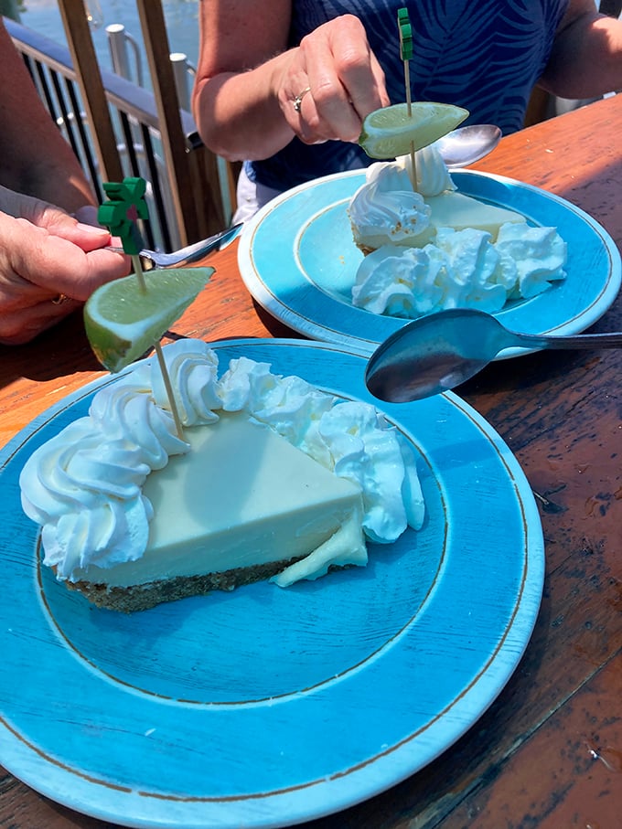 Key lime pie that makes grown adults fight over the last bite. Creamy, tart perfection topped with clouds of whipped cream.