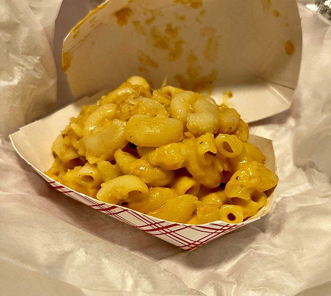 Mac and cheese that doesn't apologize for being exactly what it should be: gloriously yellow, unapologetically cheesy, and studded with seafood treasures.