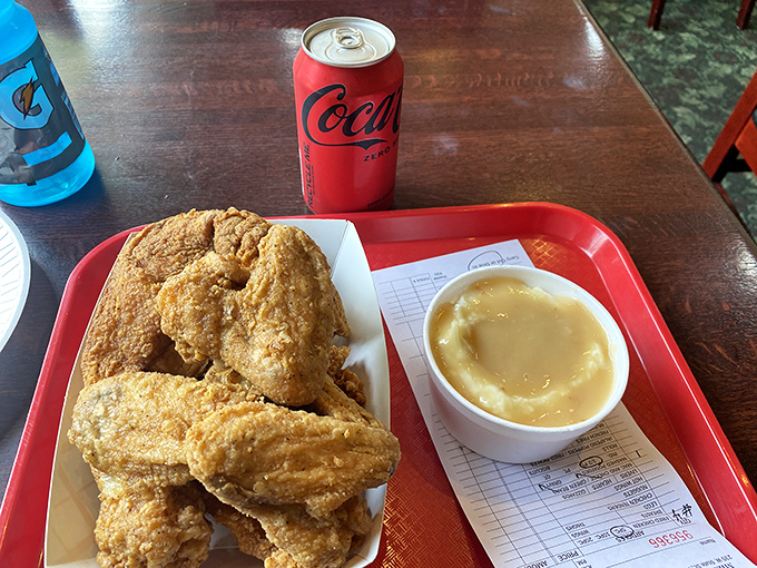 Crispy fried chicken meets cloud-like mashed potatoes—a partnership so perfect it should have its own relationship status on social media.