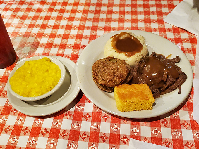 The holy trinity of Southern comfort: meatloaf, mashed potatoes with gravy, and cornbread. Add green beans for color (and so you can tell your doctor you ate vegetables).