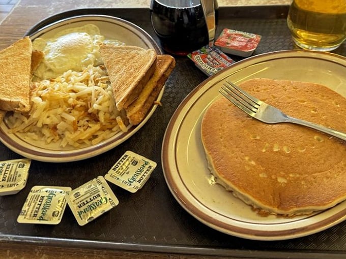 Breakfast alchemy at its finest—hash browns that crunch, pancakes that fluff, and enough coffee to jumpstart your day or your car battery.