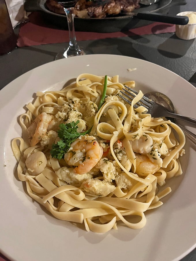 Fettuccine that would make an Italian grandmother nod in approval. Those shrimp aren't just seafood—they're little flavor bombs waiting to detonate.