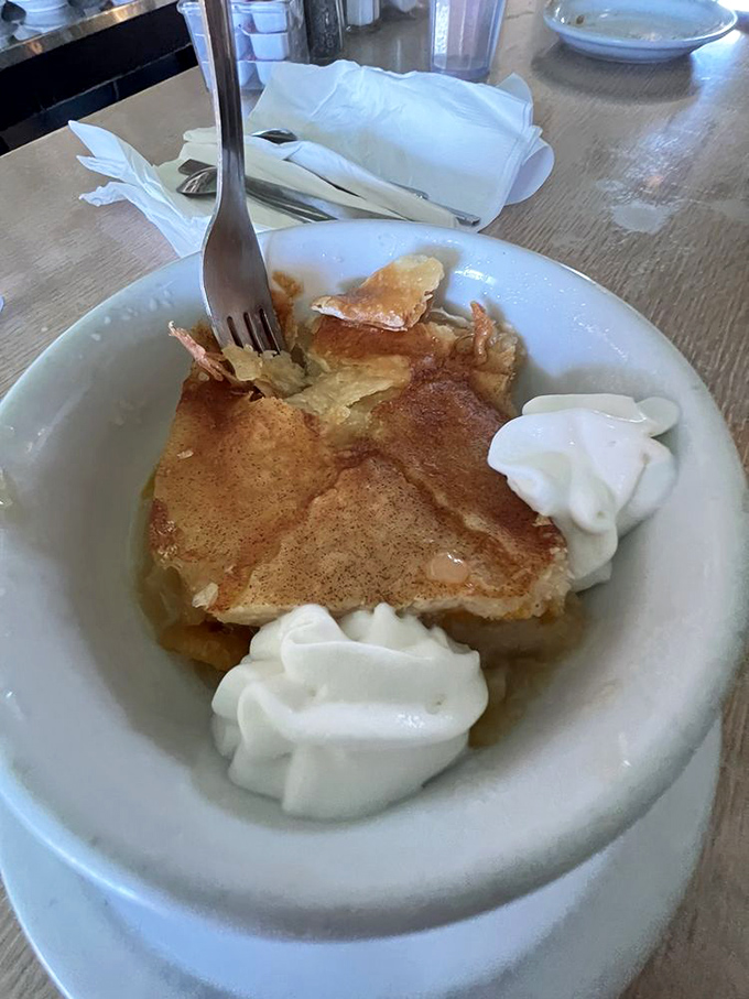 This isn't just peach cobbler – it's summer sunshine captured in a bowl, waiting to transport you to front-porch memories.