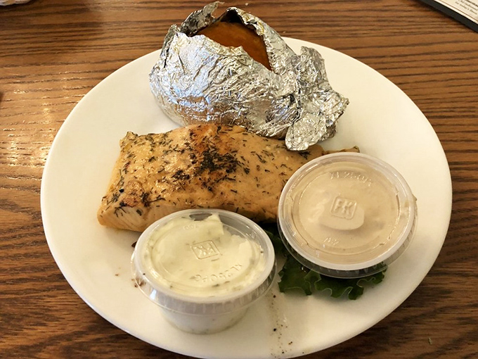 Simple food done right – a perfectly cooked piece of fish, humble sides, and the kind of presentation that says "we care about flavor, not Instagram likes."