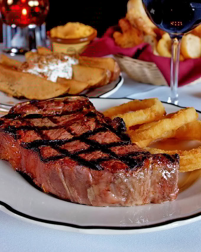 Grill marks aren't just decoration—they're a roadmap to flavor country. This steak with golden fries is the comfort food equivalent of a warm hug.