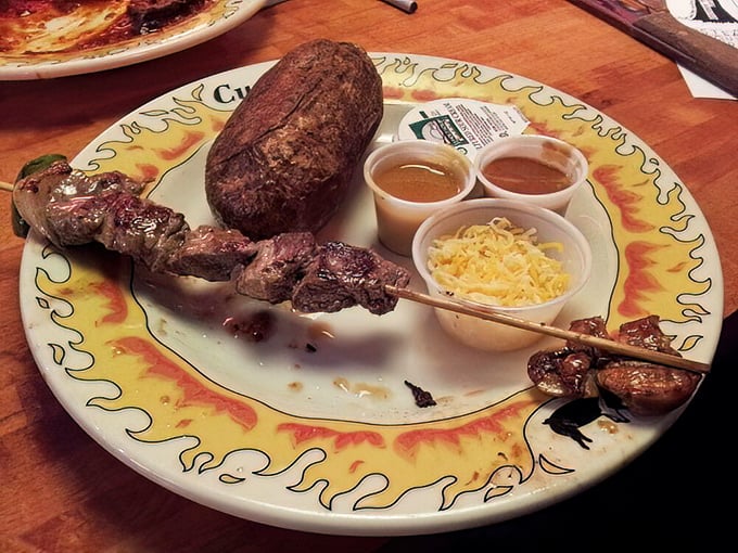 Steak on a stick – because sometimes the best dining experiences come when meat meets fire meets simplicity. Those sauces aren't just accessories, they're essential companions.