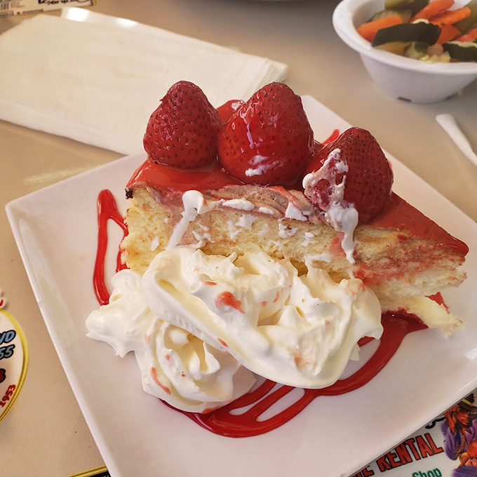 Strawberry cheesecake that doesn't need a filter—fresh berries and cream creating the kind of dessert moment you'll text friends about.