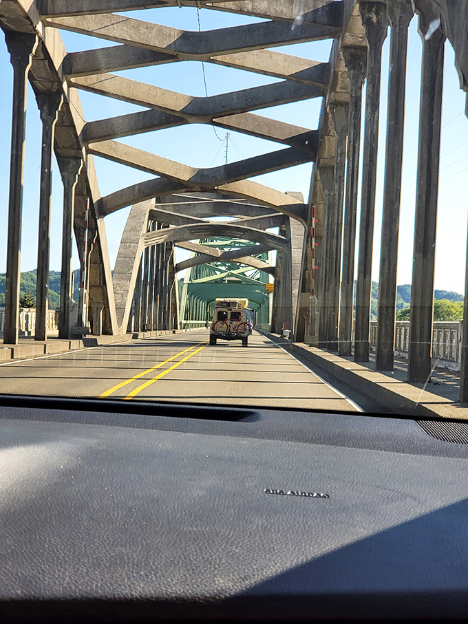 Historic bridge spans the Umpqua, connecting past and present over waters that tell Oregon's story.