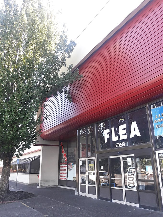 Oregon Flea Market: That red exterior is like a beacon for bargain hunters—"Treasures inside! No reasonable offer refused!"