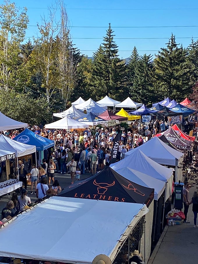 Mountains watch over a sea of tents. Park City's Sunday Market turns a ski town into a summer shopping paradise.