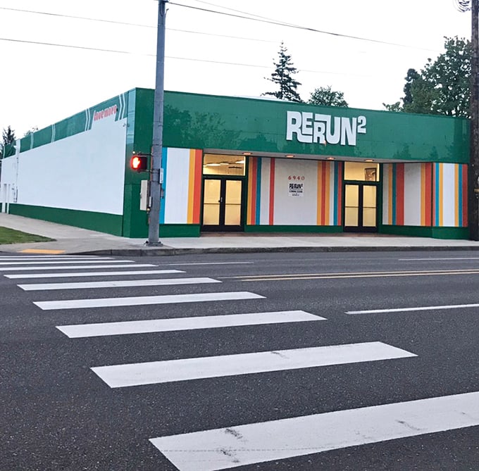 Rerun's vibrant rainbow stripes and green exterior make it the peacock of Portland's thrift store scene.