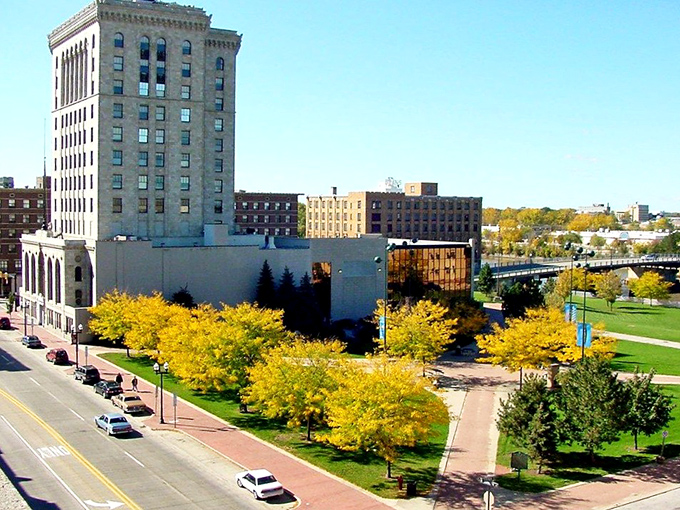 Saginaw's historic buildings stand tall against blue skies – affordable living with a side of architectural grandeur!