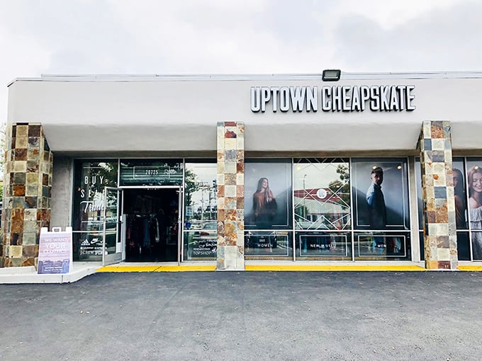 Uptown Cheapskate brings boutique vibes to the thrifting scene. Those stone columns frame a doorway to fashion finds without financial regret!
