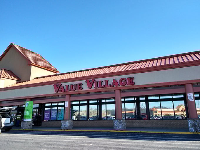 Value Village's sunset-kissed storefront glows like a beacon for bargain hunters. That red roof has sheltered countless treasure-finding victories.