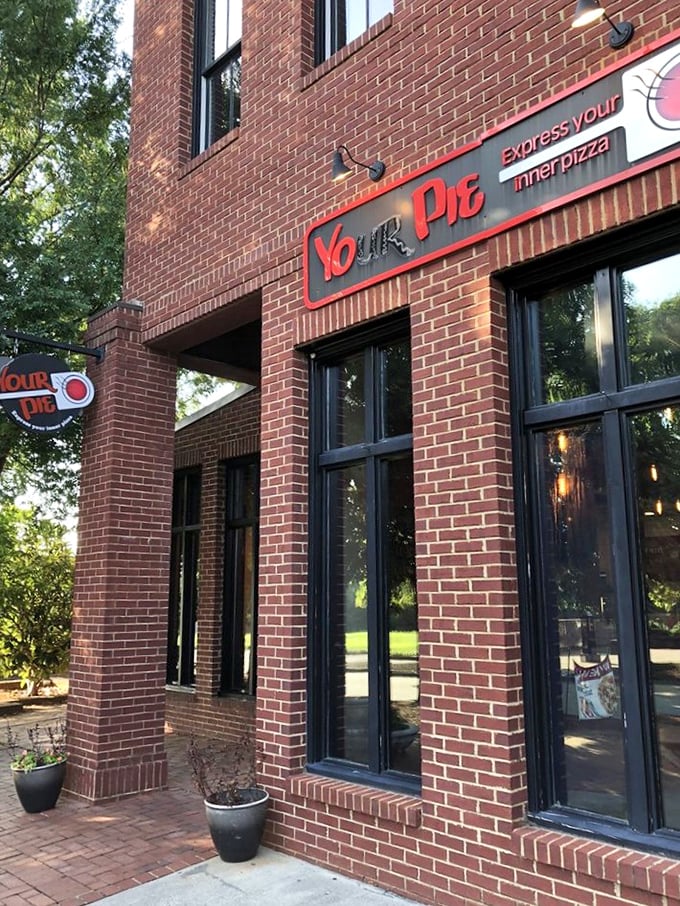 Your Pie's brick façade and modern signage invite you to express yourself through toppings—it's like pizza therapy, but tastier.
