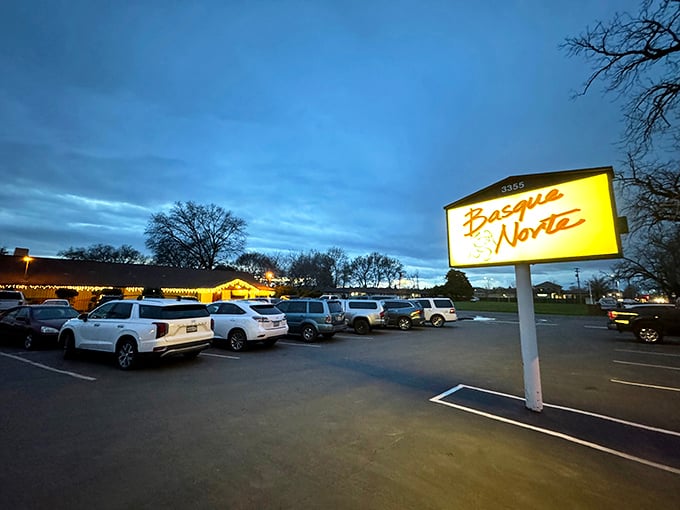 Dusk settles over Basque Norte's parking lot – inside, tables are being loaded with family-style delights.