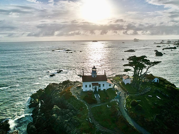Surrounded by crashing waves, this lighthouse lives on its own private island like maritime royalty. 
