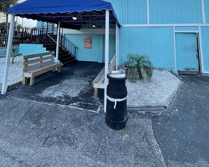 Those simple wooden benches have witnessed countless "first bite" faces – that moment when grouper perfection meets taste buds.