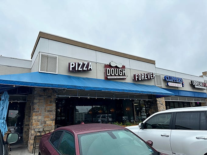 Dough Pizzeria Napoletana: "Pizza poetry written in dough and flame. The sign says it all – this place is forever devoted to perfect pies."