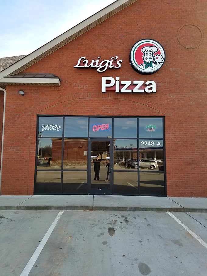 That brick facade hides a pizza paradise where the cheese stretches and the crust crackles just like it should.