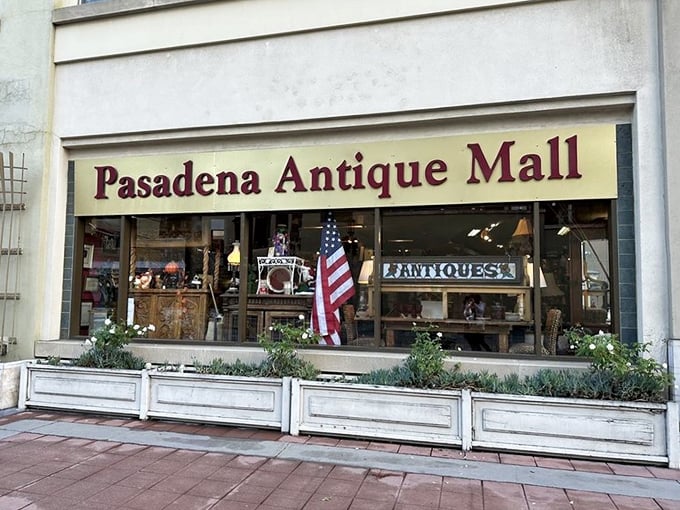 Window shopping at Pasadena Antique Mall – where vintage Americana meets California elegance behind pristine glass.